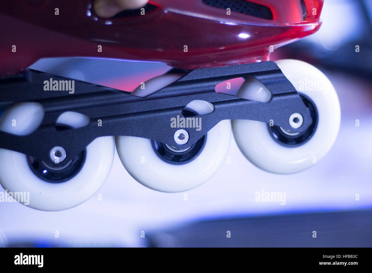 Freestyle inline skates boots and wheels in retail store shop window ...