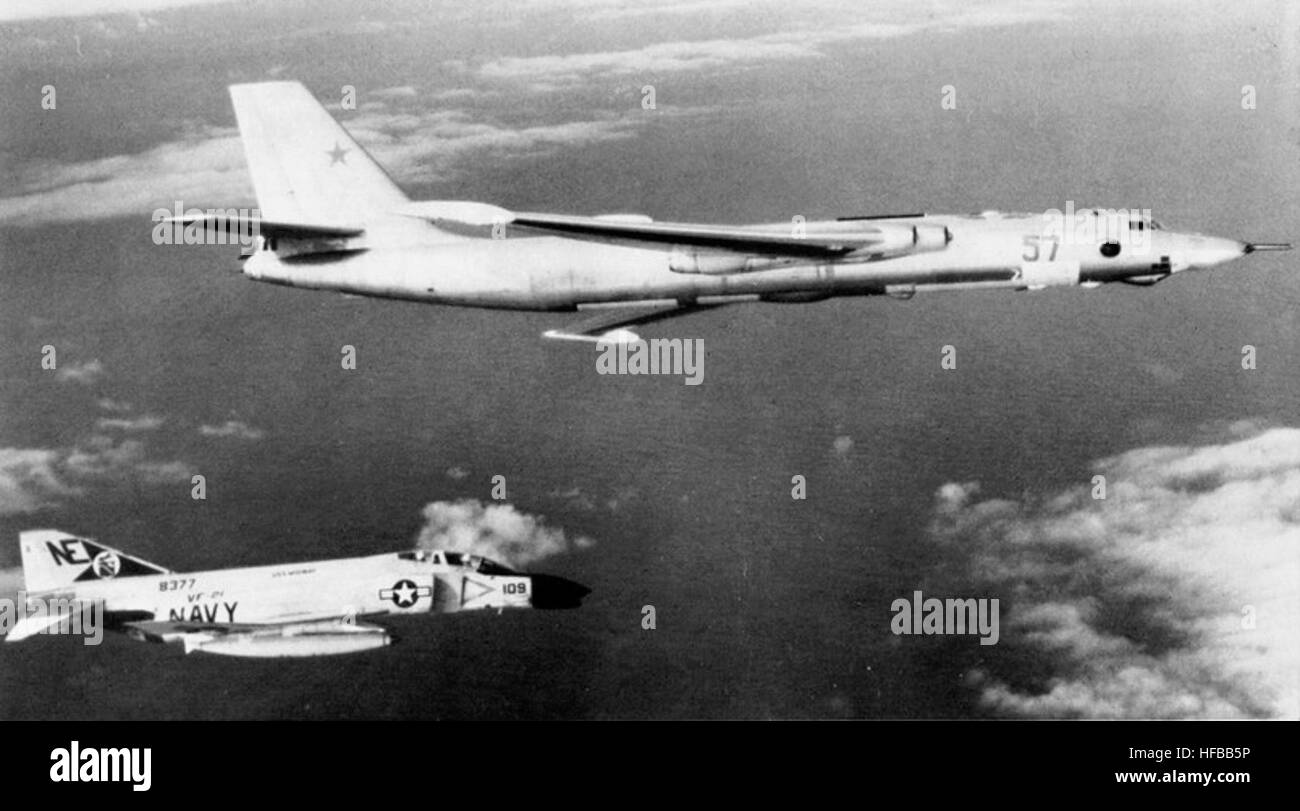 An F-4B Phantom II of VF-21 squadron intercepts a Soviet Bison aircraft ...