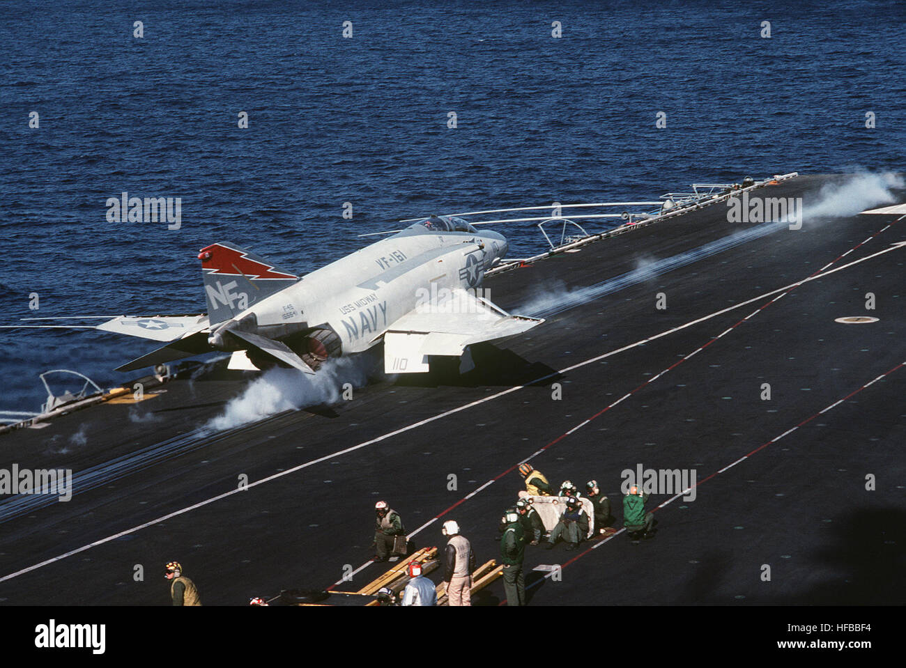 An F-4S Phantom II aircraft from Fighter Squadron 161 is catapulted ...