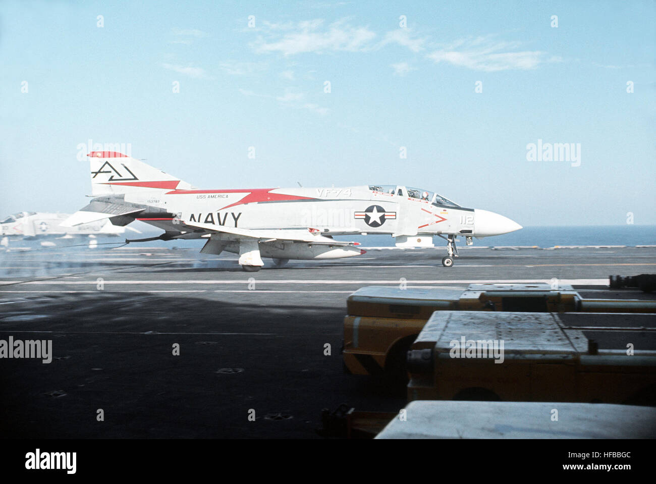 A Fighter Squadron 74 (VF-74) F-4J Phantom II aircraft lands aboard the ...