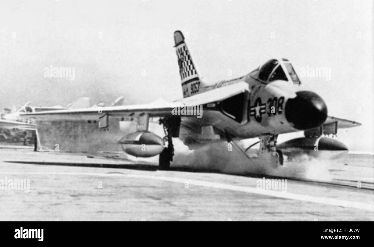 An F4D-1 Skyray from Fighter Squadron 213 is pictured with CAG markings ...