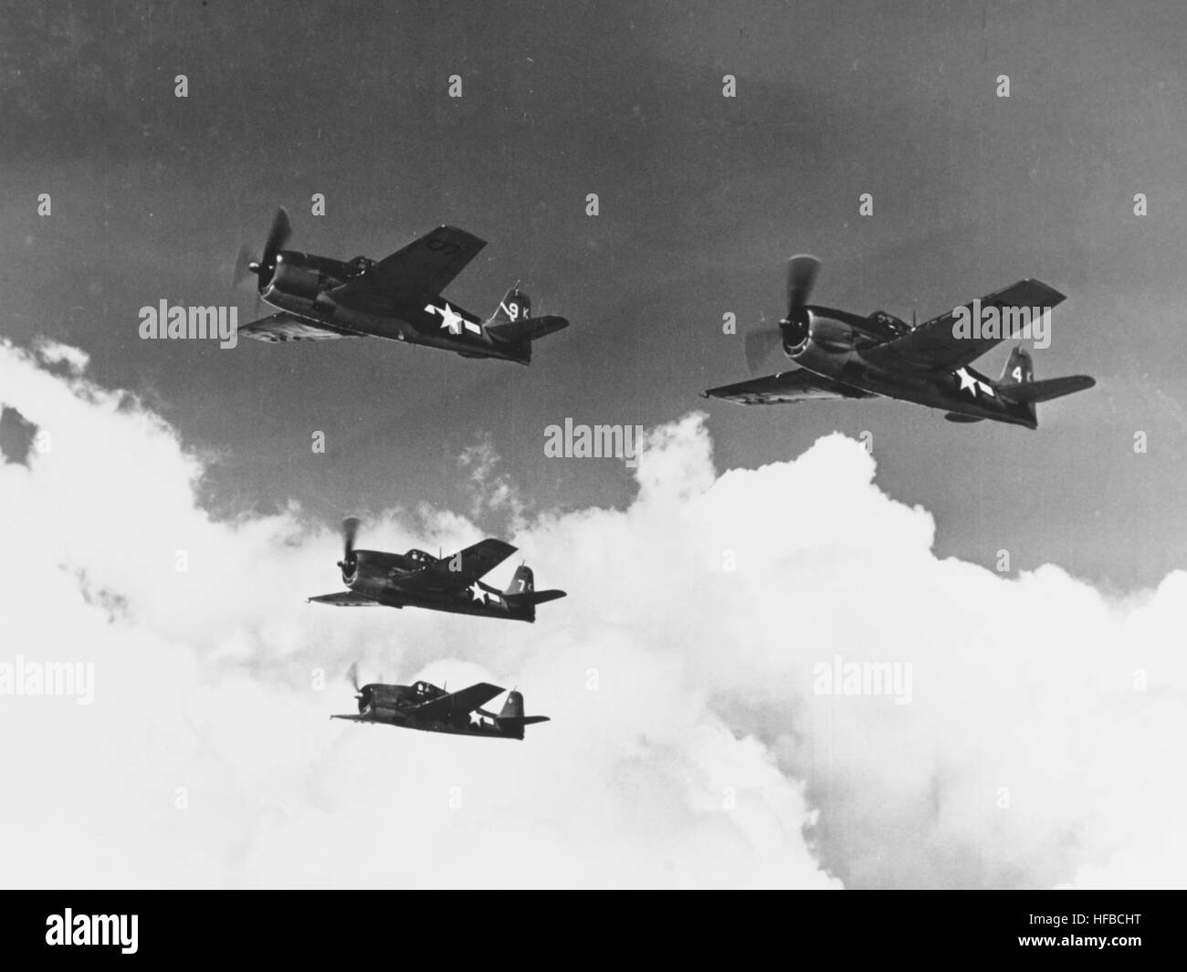 F6F Hellcat aircraft of Fighter Squadron 1 (VF-1) are shown in flight ...