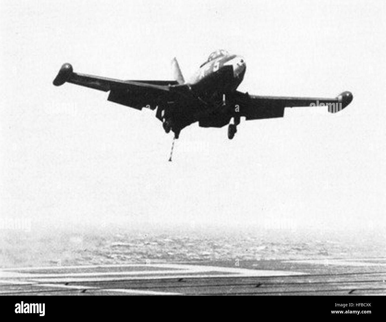 F9F-5 Panther of VF(AW)-4 lands on USS Antietam (CVS-36) in 1956 Stock ...