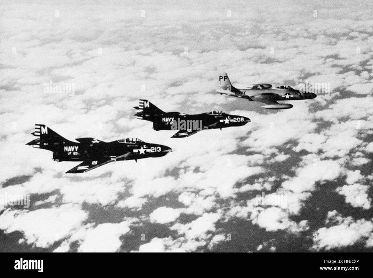 F9F-6 Cougars of VF-63 escort F2H-2P of VC-61 c1955 Stock Photo - Alamy