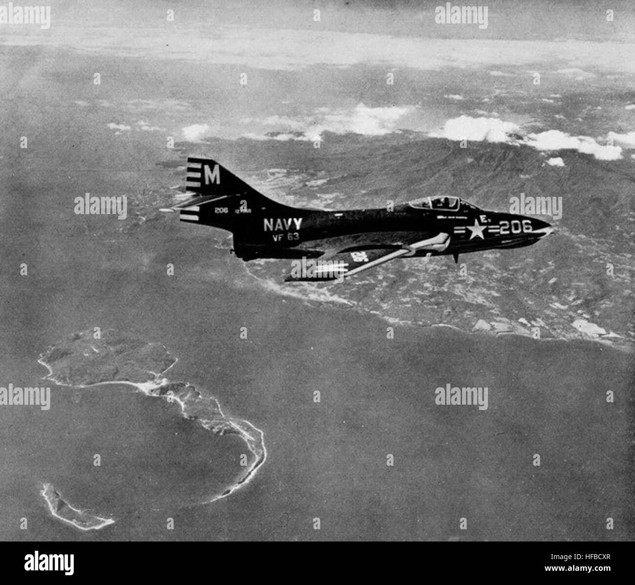 F9F-6 Cougar of VF-63 flies over Corregidor c1954 Stock Photo - Alamy