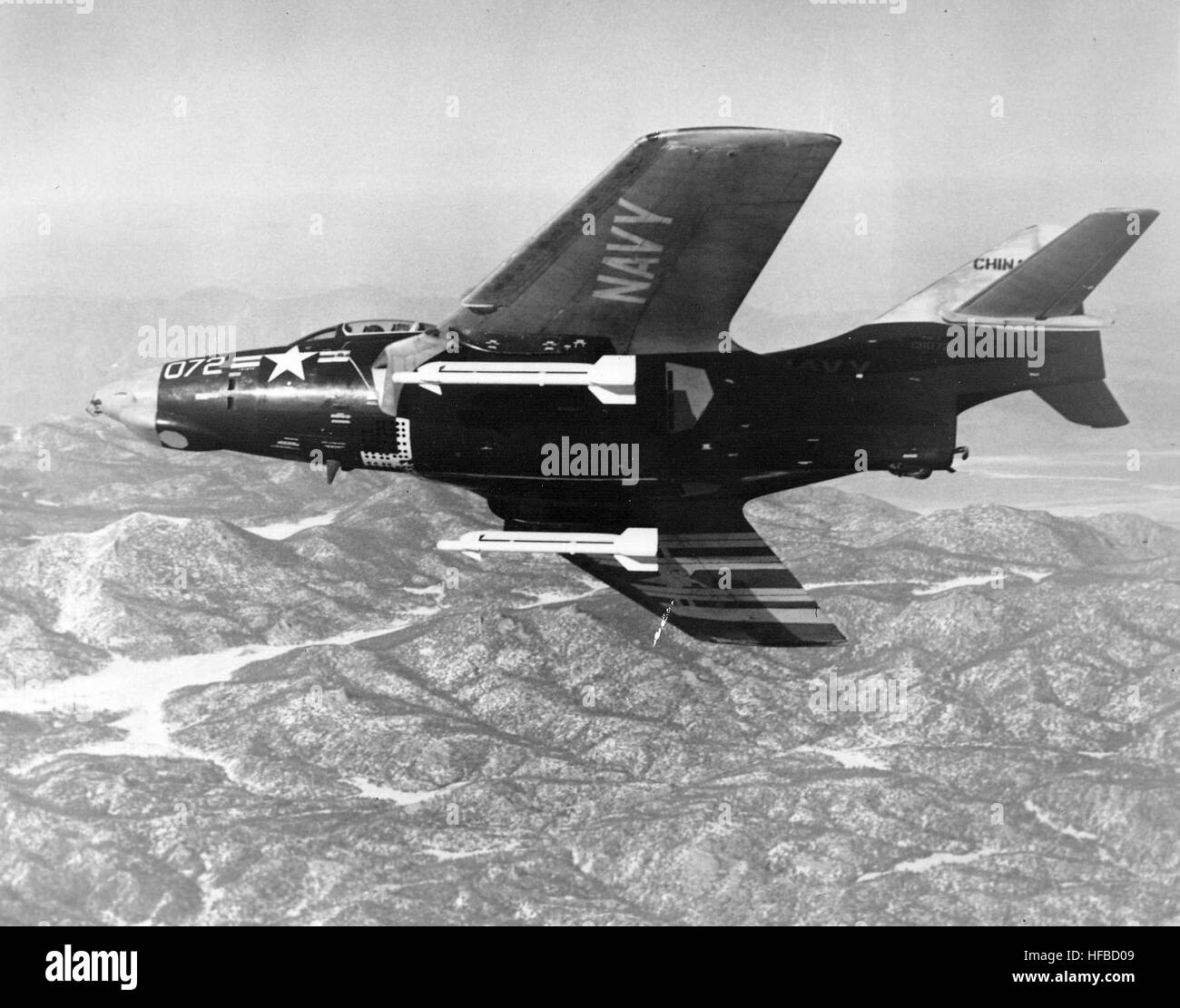 F9F-8 Panther aircraft equipped with AIM-9 Sidewinder missiles operate ...