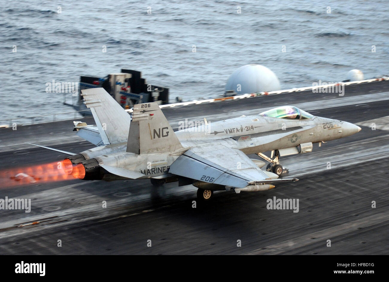 020412-N-7397A-023 At sea aboard USS John C. Stennis (CVN 74) Apr. 12, 2002 -- An F/A-18 "Hornet ...