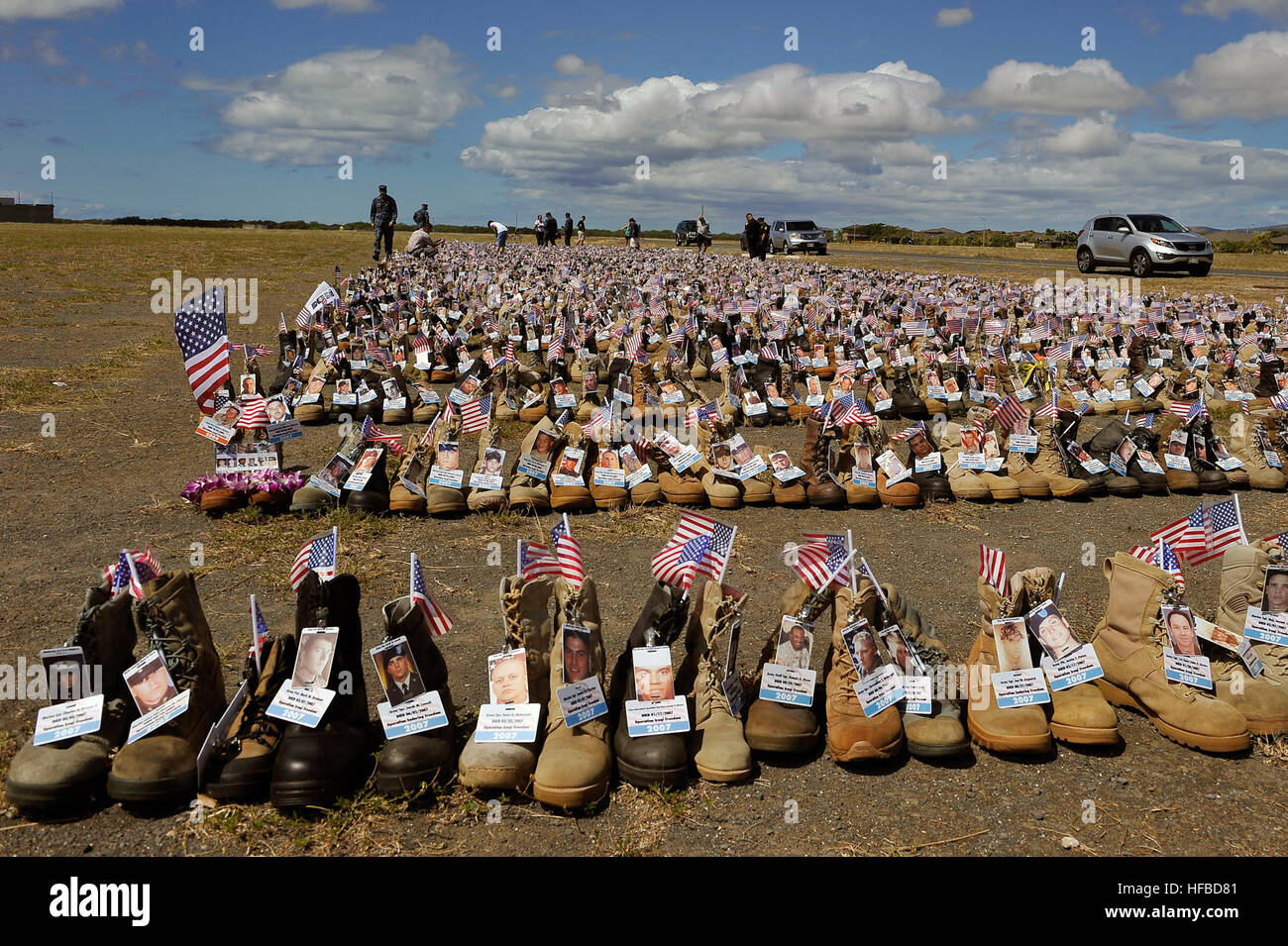 Combat boots with the names and pictures of those lost in Operations ...