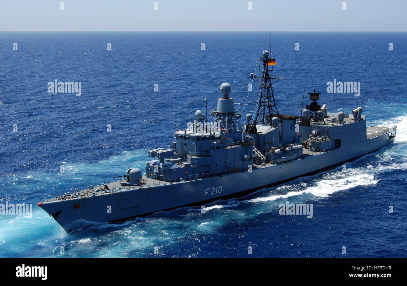 German frigate Emden (F 210) participates in a pass and review during ...