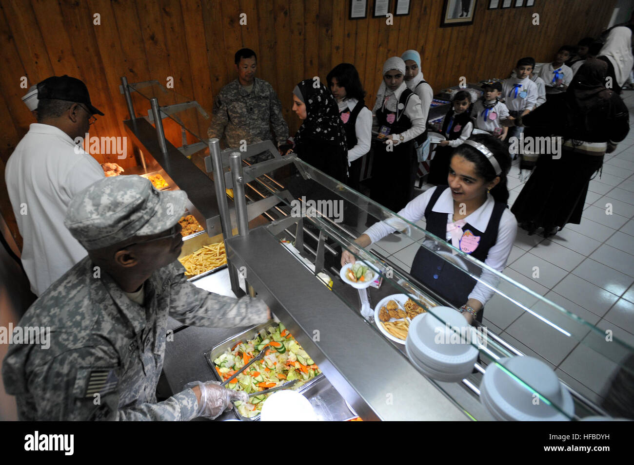 Iraqi children visit the chow hall at Forward Operating Base Falcon ...