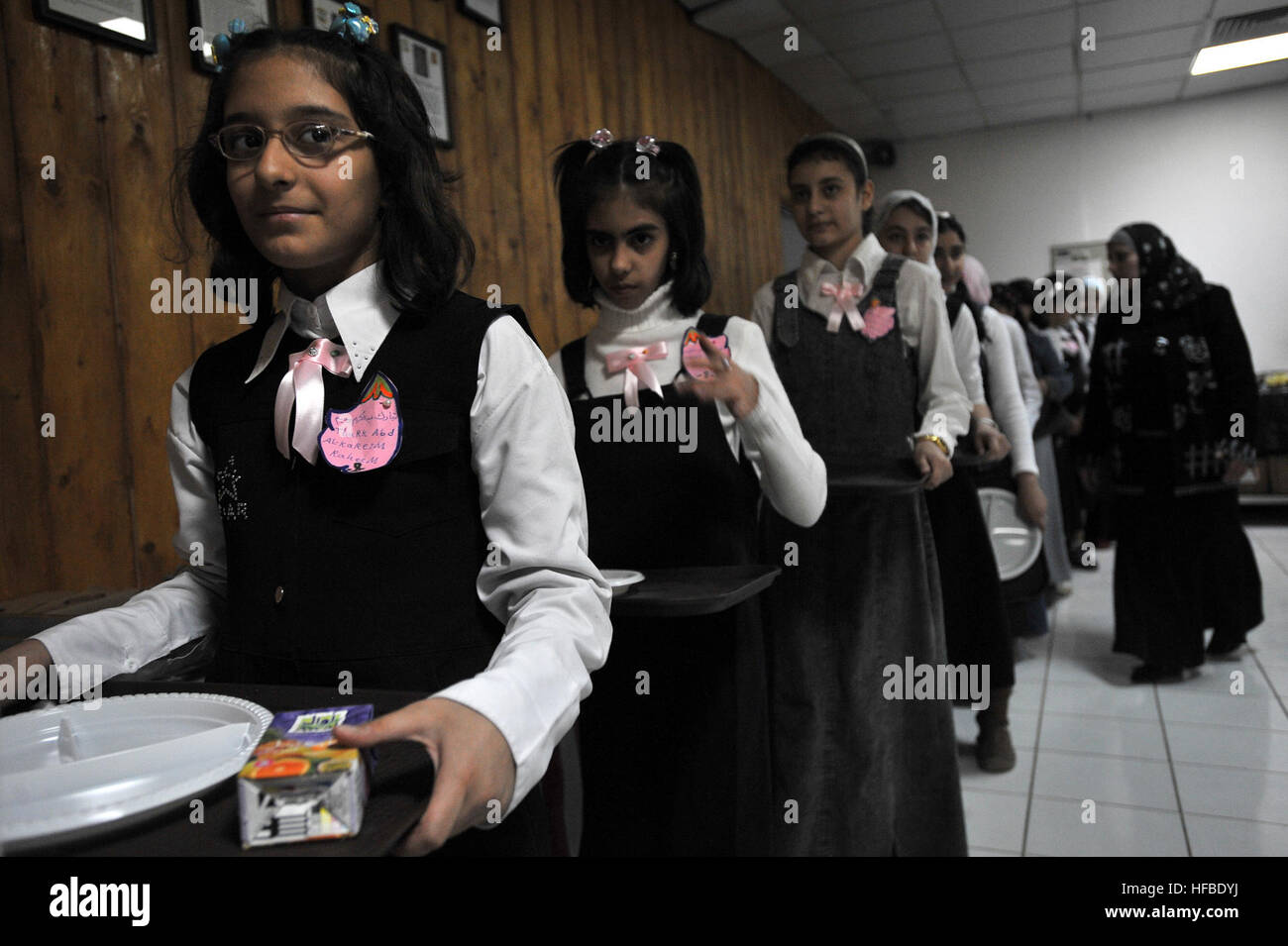Iraqi children visit the chow hall at Forward Operating Base Falcon ...