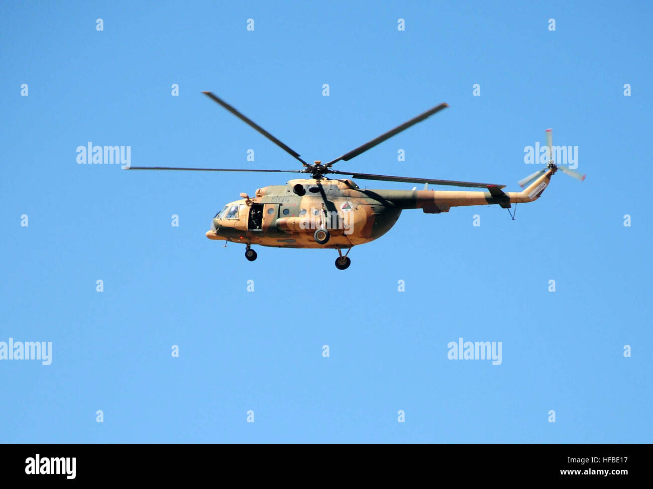 An Afghan Air Force student pilot flies an MI-17 helicopter during a ...