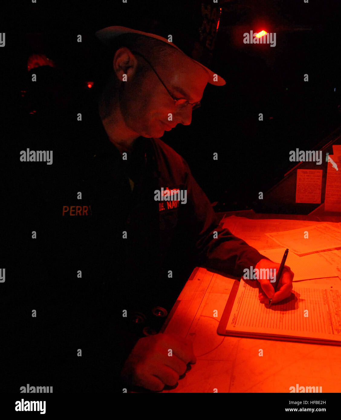 Officer of the Deck, Lt. Cmdr. Vincent Perry makes the first official ...