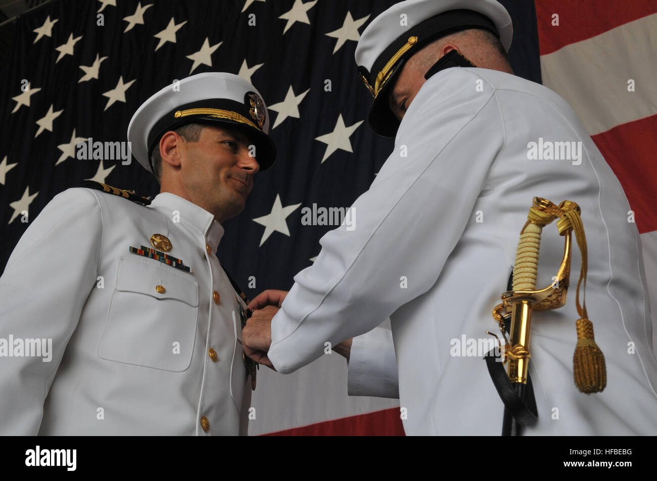 Commander Nicholas J. Melfi is presented with the Meritorious Service ...