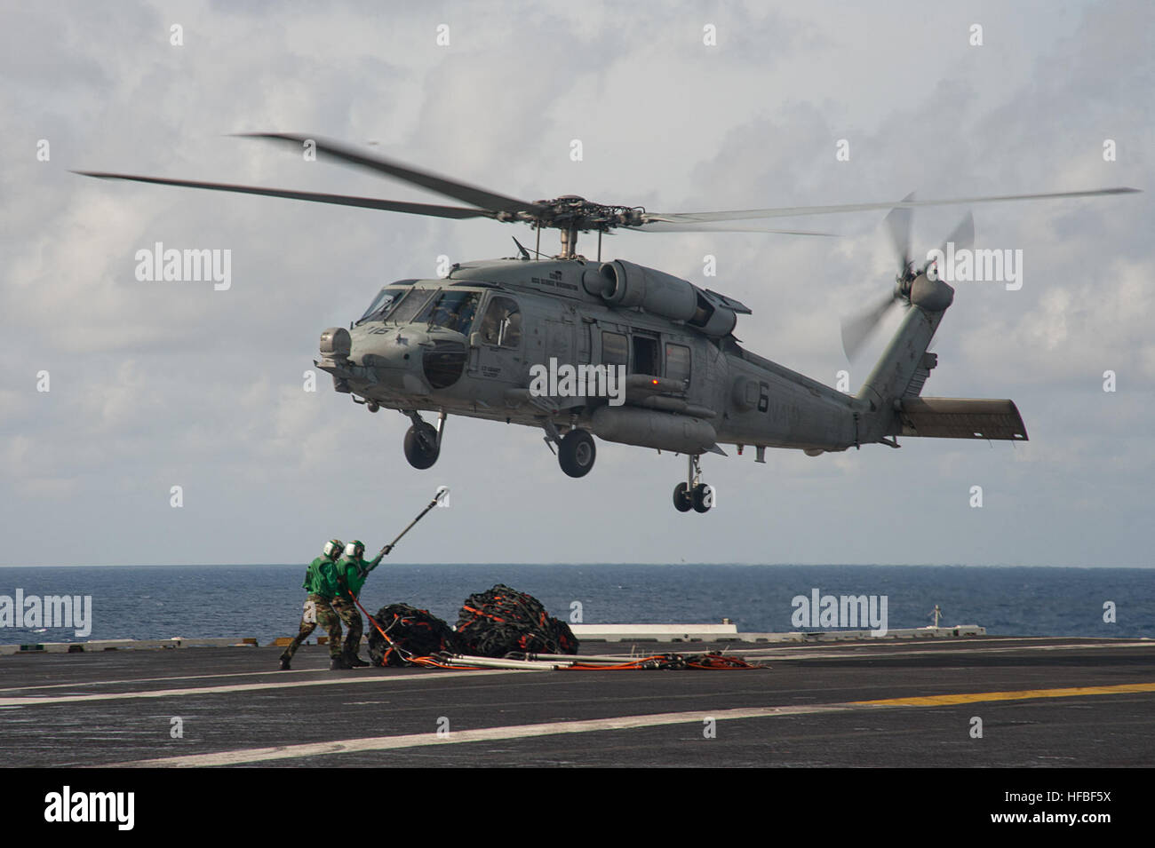 SOUTH CHINA SEA (Oct. 18, 2012) Sailors aboard the aircraft carrier USS ...