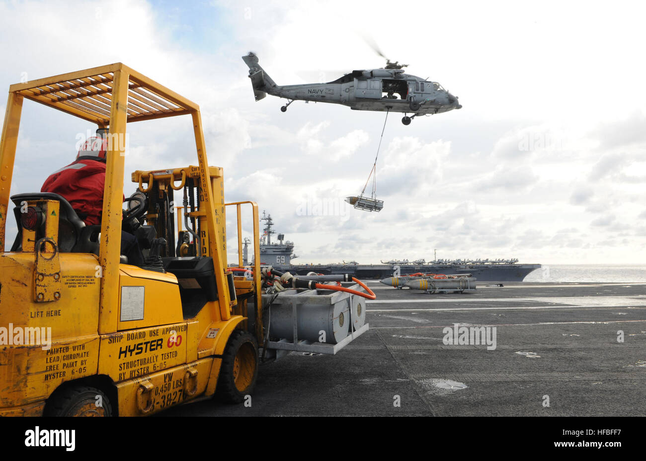 An MH-60S Sea Hawk helicopter from Helicopter Sea Combat Squadron 22 ...