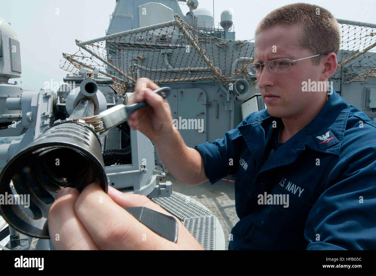 120724-N-NU634-051 ARABIAN SEA (July 24, 2012) Gunners Mate 3rd Class ...