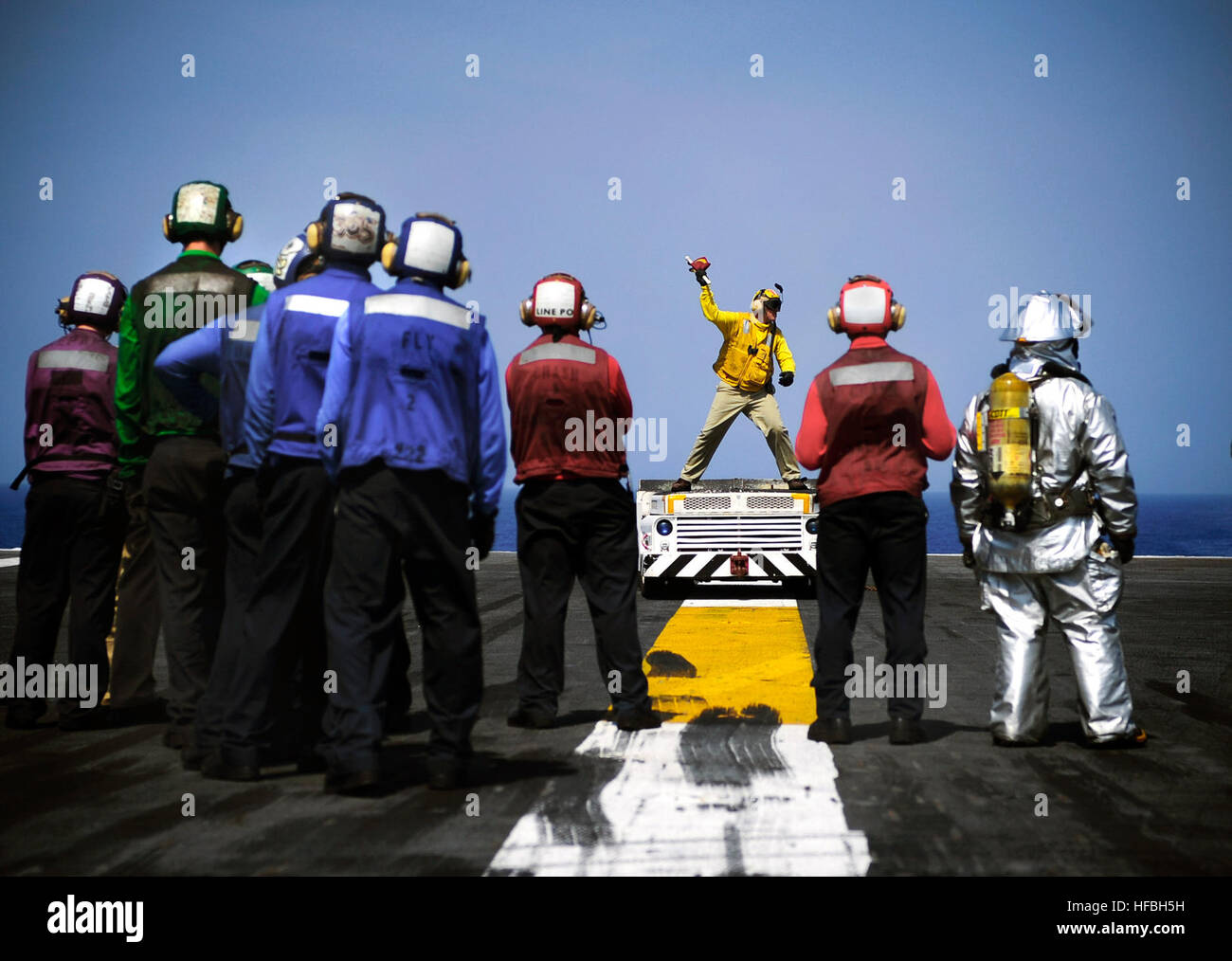 120504-N-XE109-086 ATLANTIC OCEAN (May 4, 2012) Lt. Kent Davis waves a ...