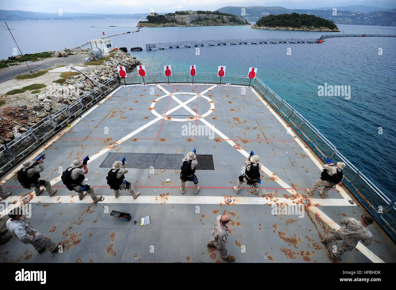 Boarding team members aboard USS Simpson conduct small-arms training ...