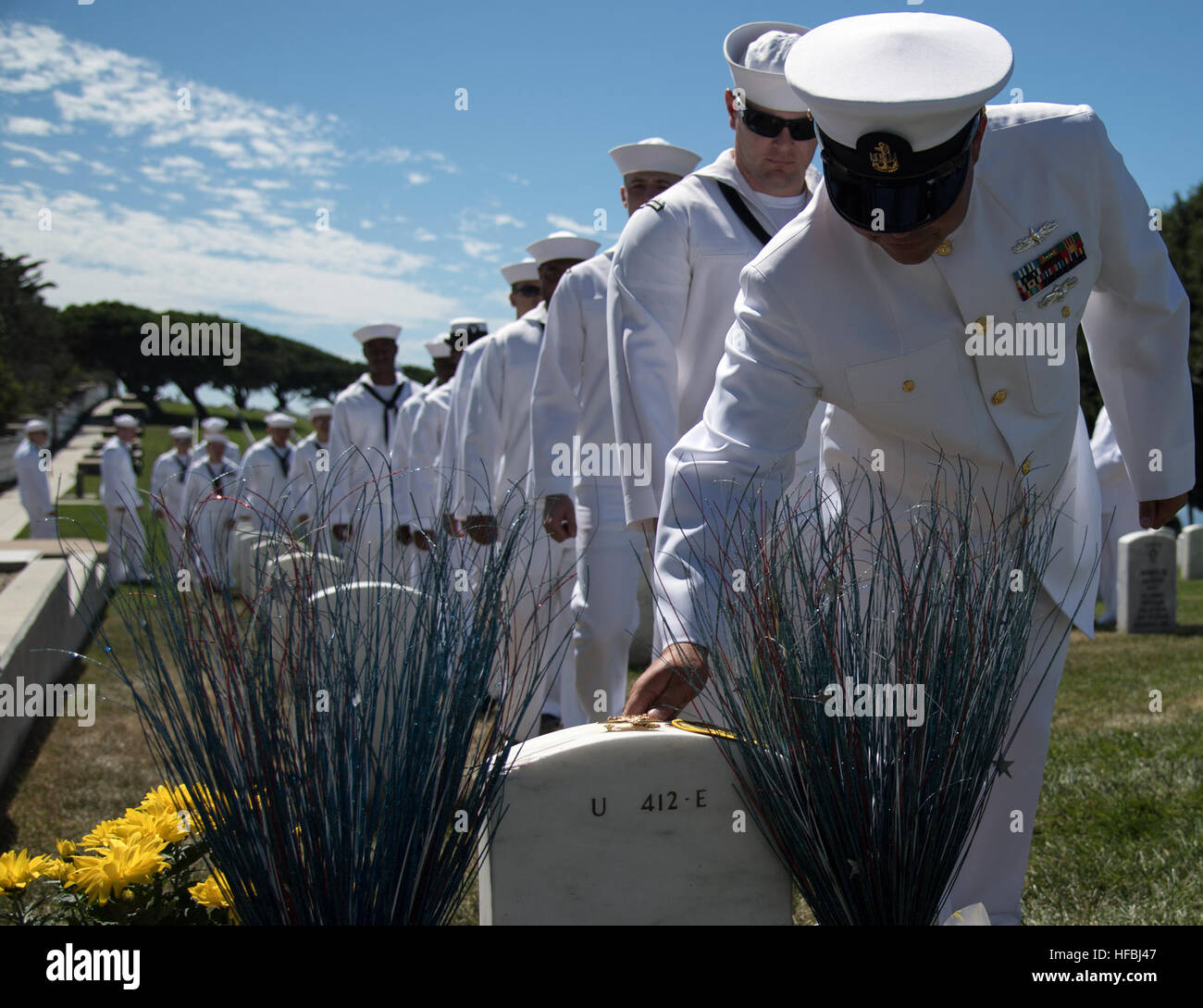The crew of USS Michael Monsoor (DDG 1001) conducts a memorial ...