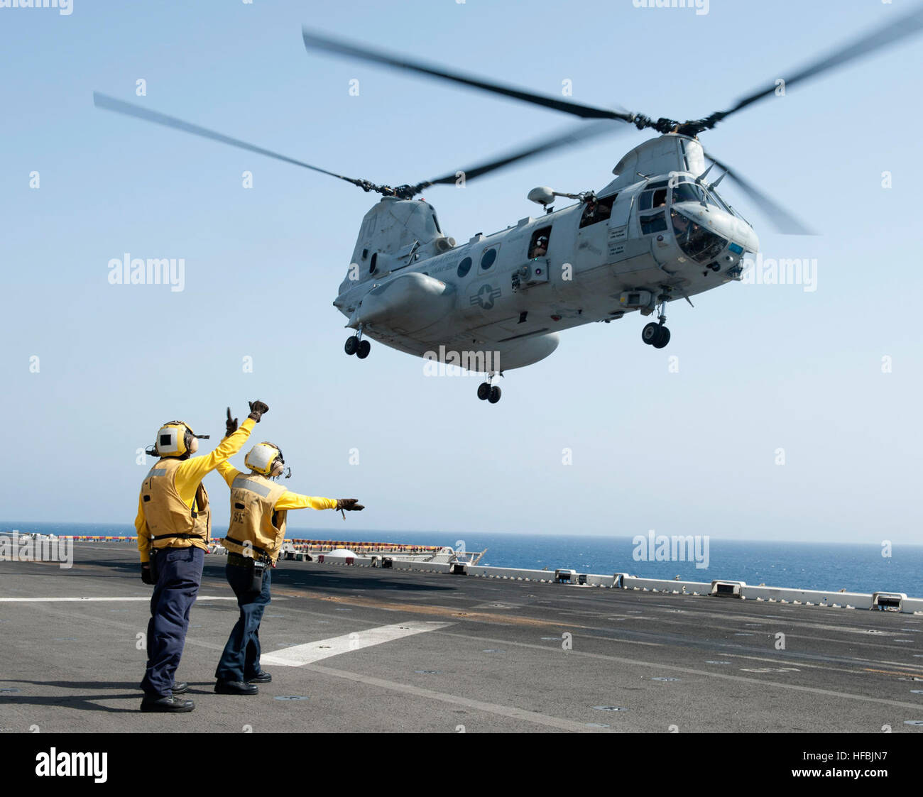 RED SEA (April 16, 2012) Aircraft handlers signal a CH-46E Sea Knight ...
