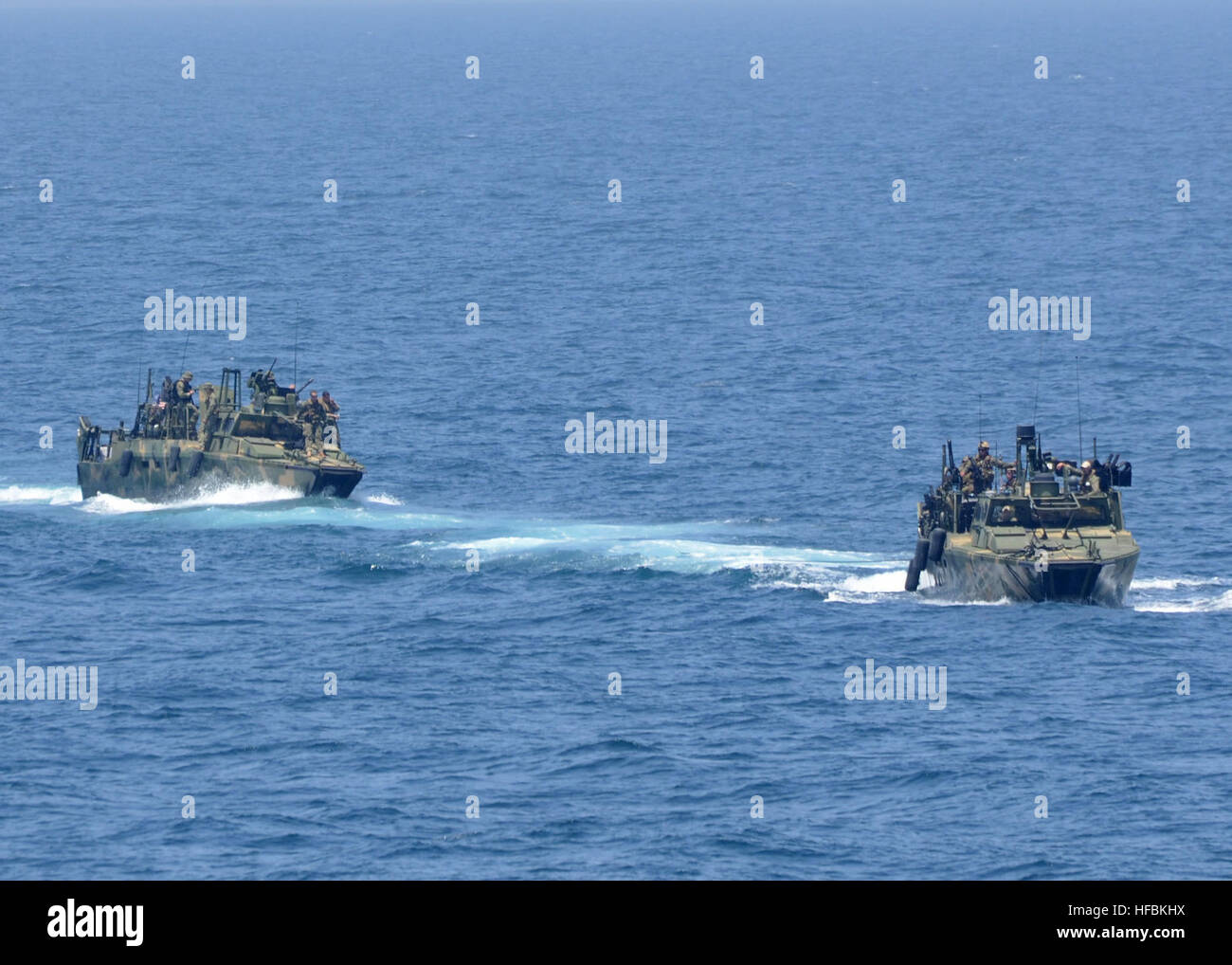 Military transport boats at iwo jima hi-res stock photography and ...