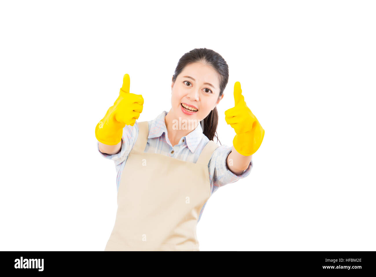 Cleaning woman happy excited showing thumbs up success hand sign ...