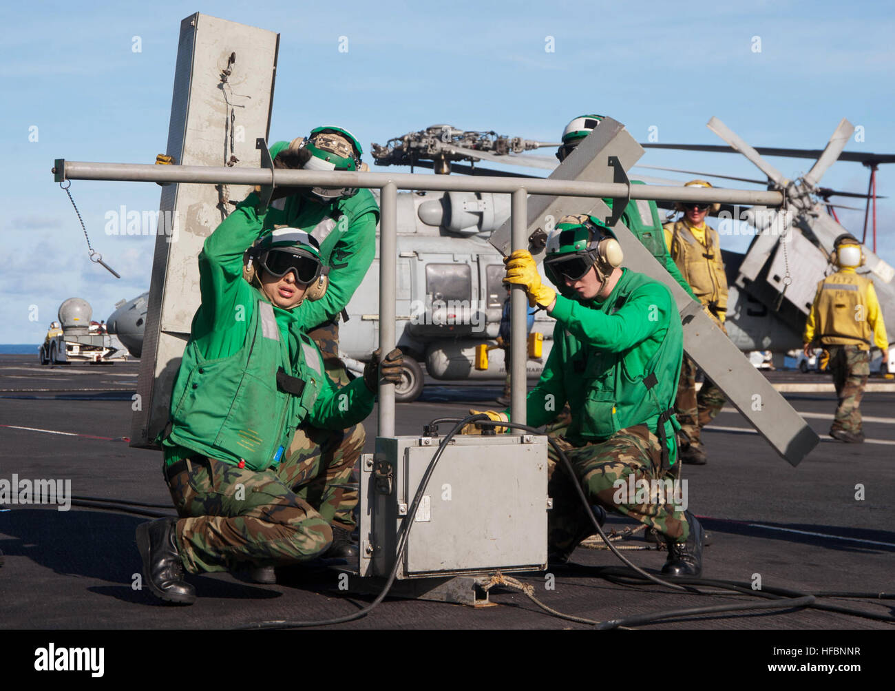 PACIFIC OCEAN (Sept. 13, 2012) Sailors aboard the aircraft carrier USS ...