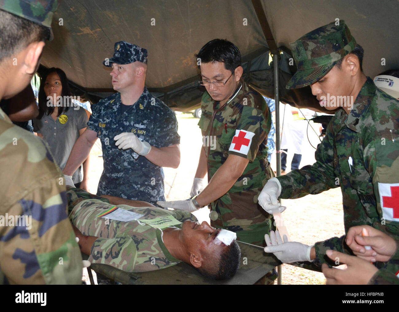 U.S. Navy medical personnel review triage procedures with Royal Thai ...