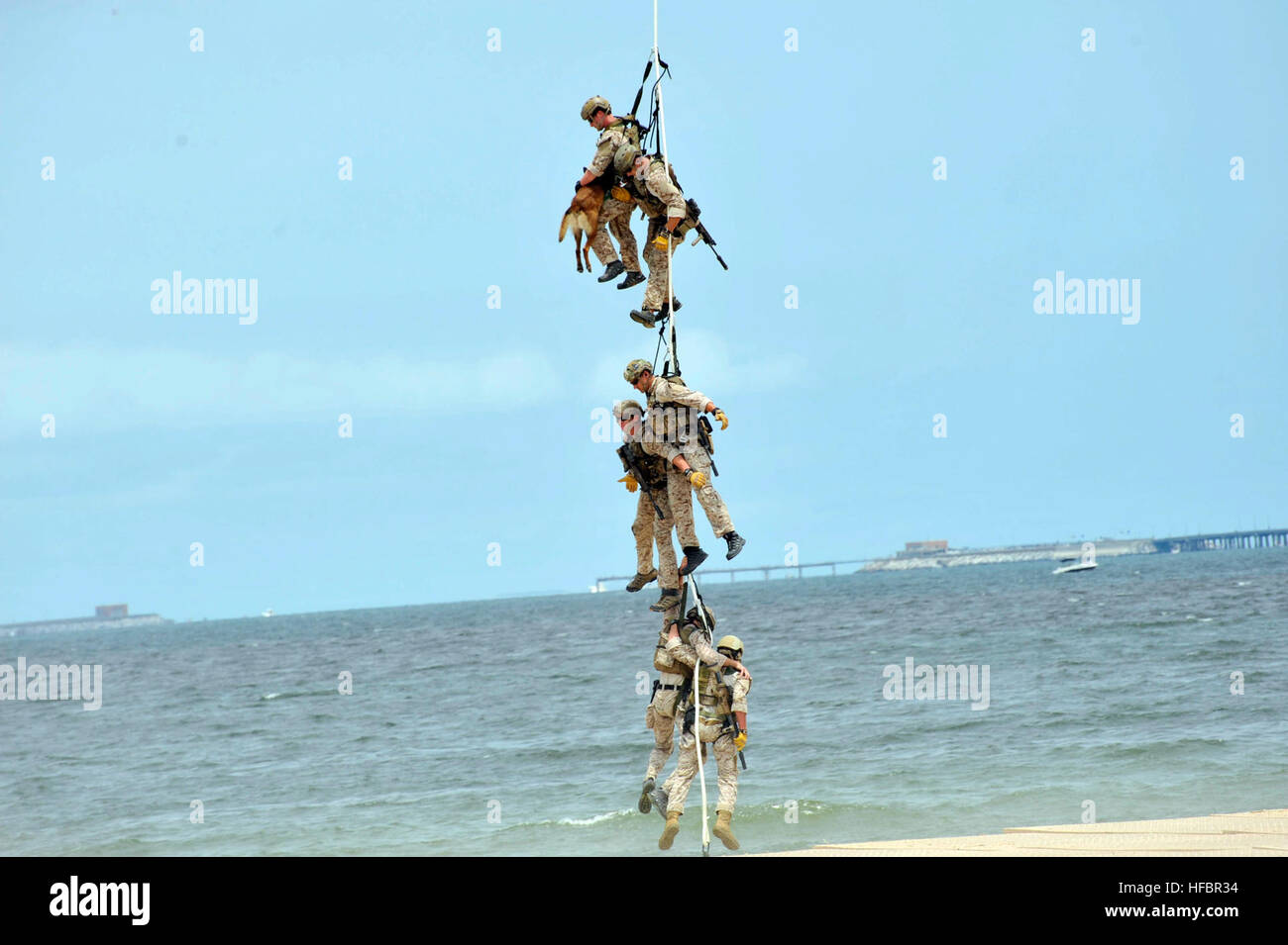 Navy SEALs demonstrate the Special Patrol Insertion/Extraction (SPIE ...