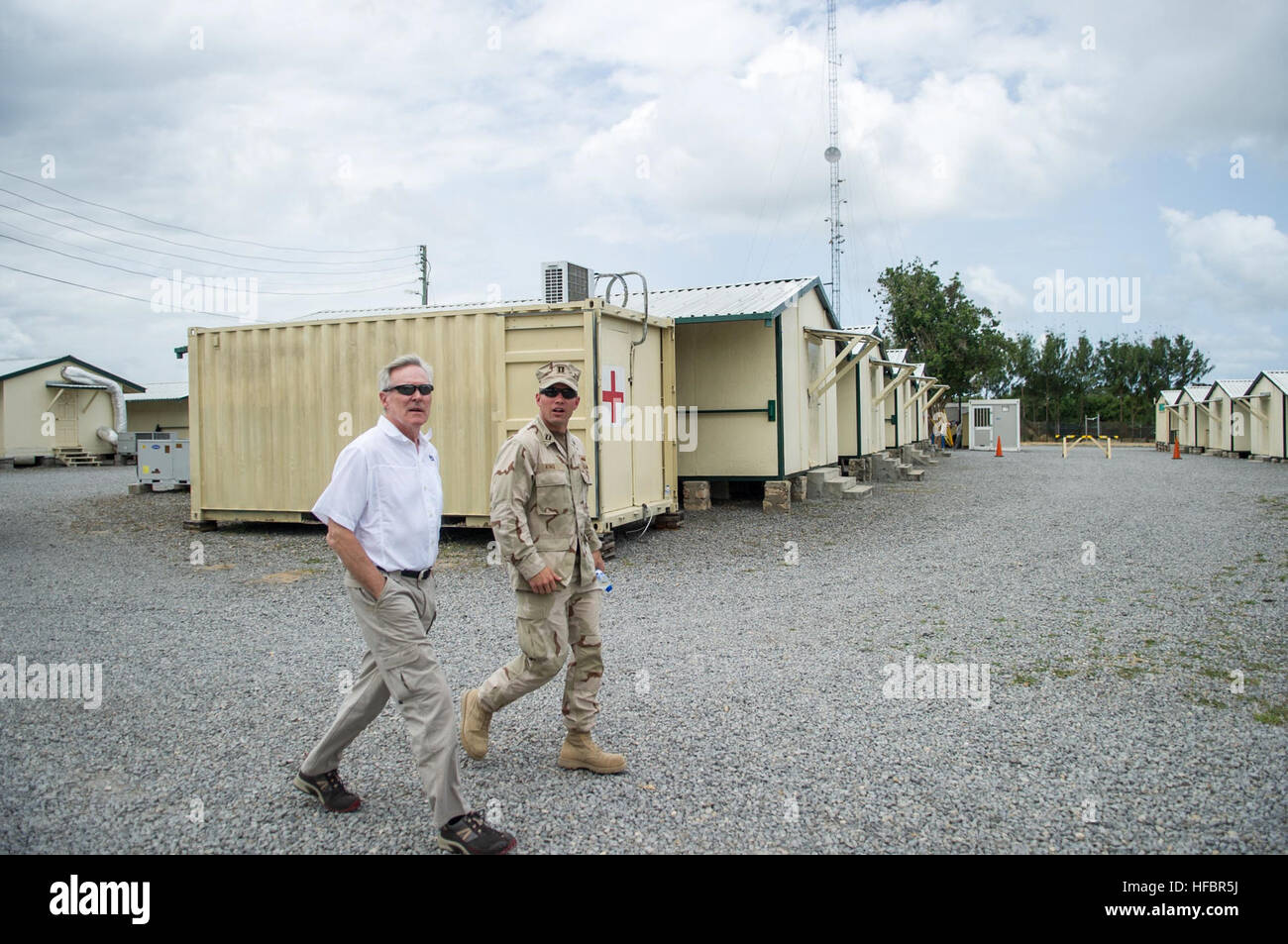 120824-N-AC887-004 MANDA BAY, Kenya (Aug. 24, 2012) Lt. Matt King gives Secretary of the Navy ...