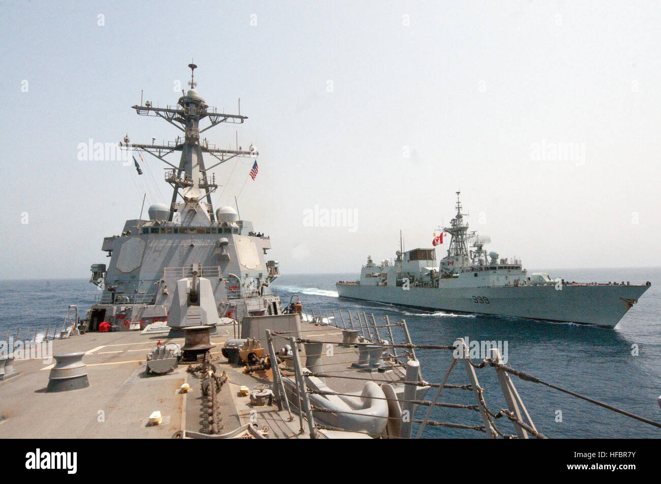 USS Nitze and HMCS Charlottetown conduct a joint training exercise in ...
