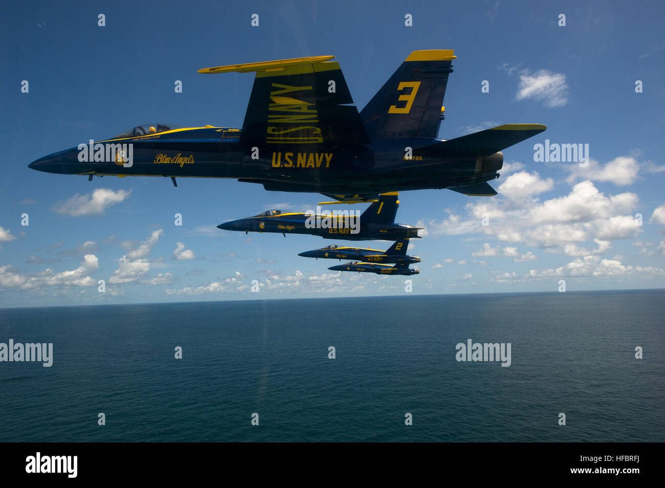 The Blue Angels perform a line-abreast flat pass maneuver over ...