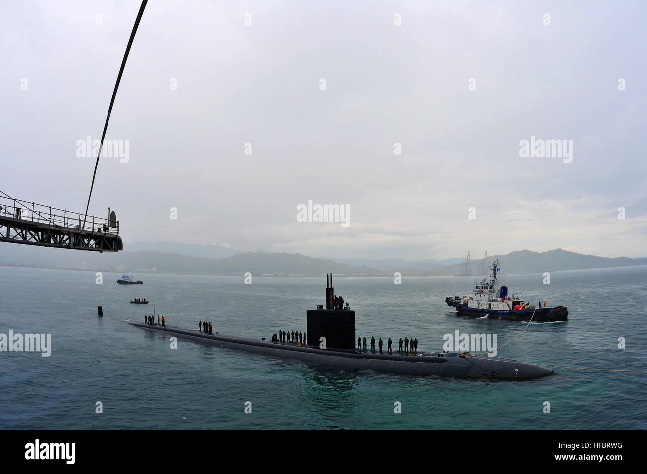 USS Columbia, a Los Angeles-class attack submarine, prepares to come ...