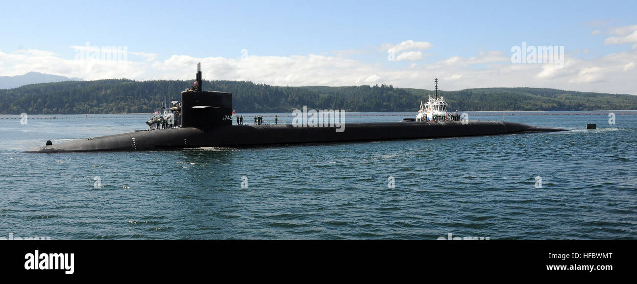 The Ohio-class ballistic missile submarine USS Louisiana returns to its ...