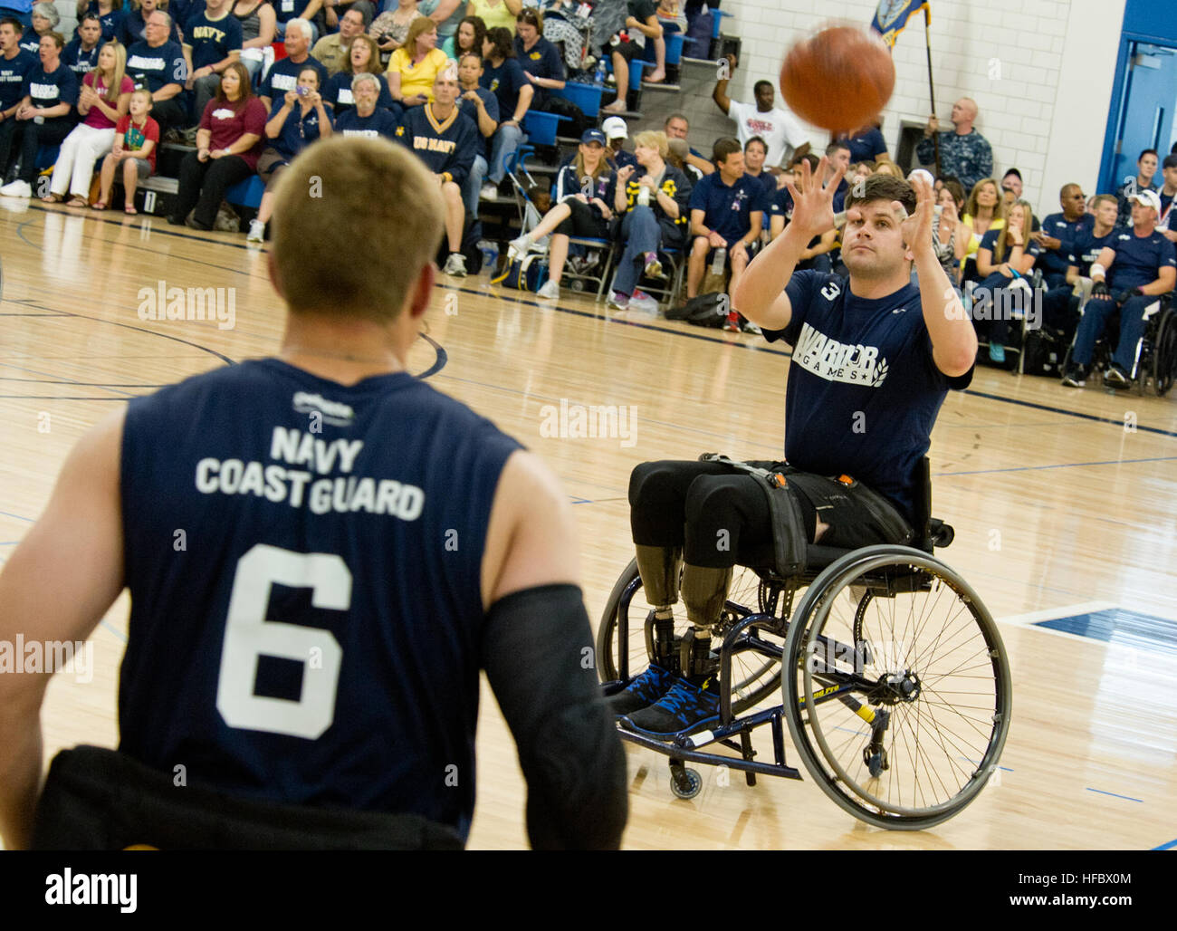 Hospital Corpsman 2nd Class Max Rohn passes to Explosive Ordnance ...