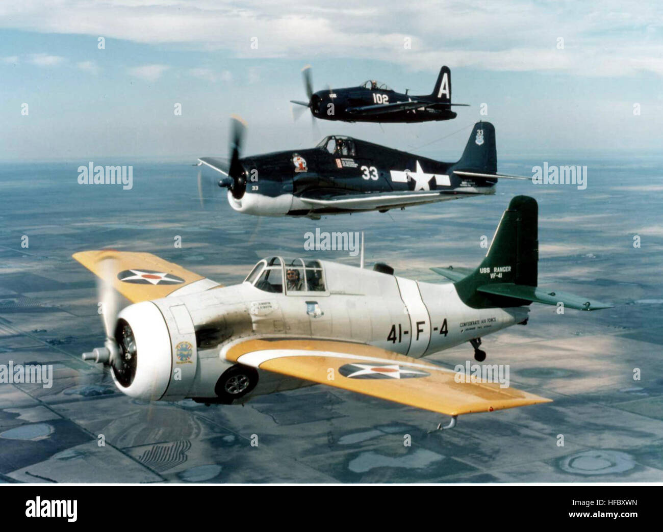 FM Wildcat F6F Hellcat and F8F Bearcat warbirds in flight Stock Photo ...