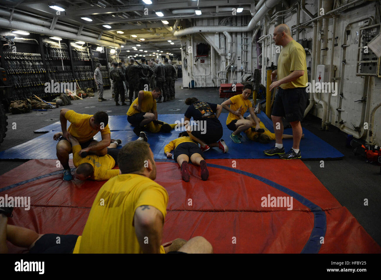 U.S. Sailors participate in force protection training aboard the ...