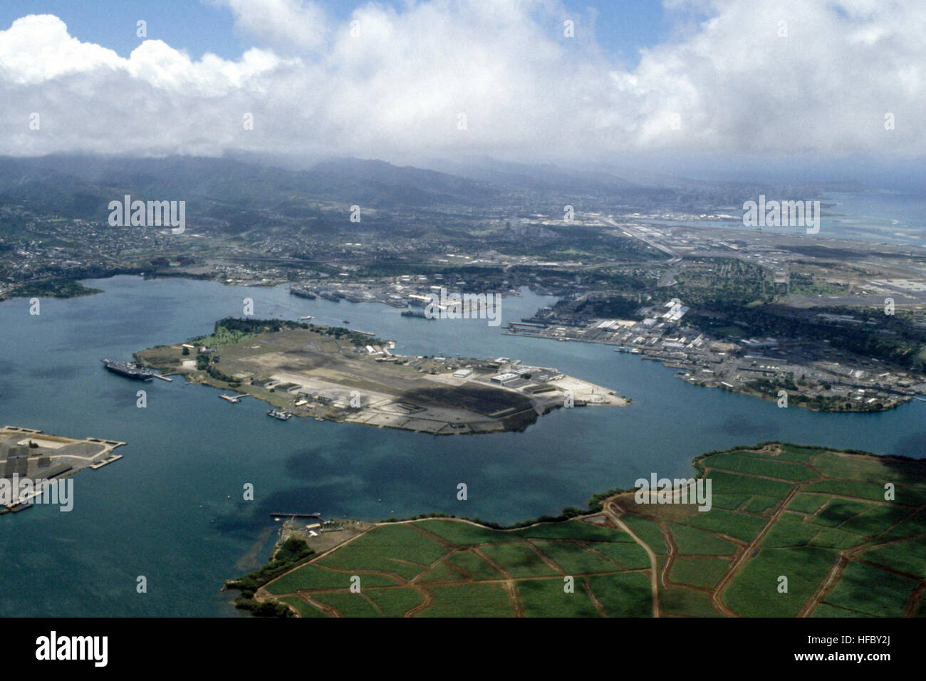 An aerial view of Ford Island and the surrounding naval facilities ...