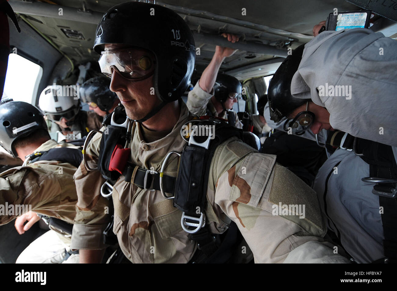 Sailors assigned to Explosive Ordnance Disposal Mobile Unit 1 and Naval ...