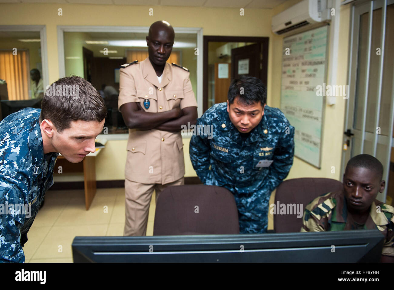 From left, U.S. Navy Lt. Anthony Blaine, Senegalese navy Cmdr. Oumar ...