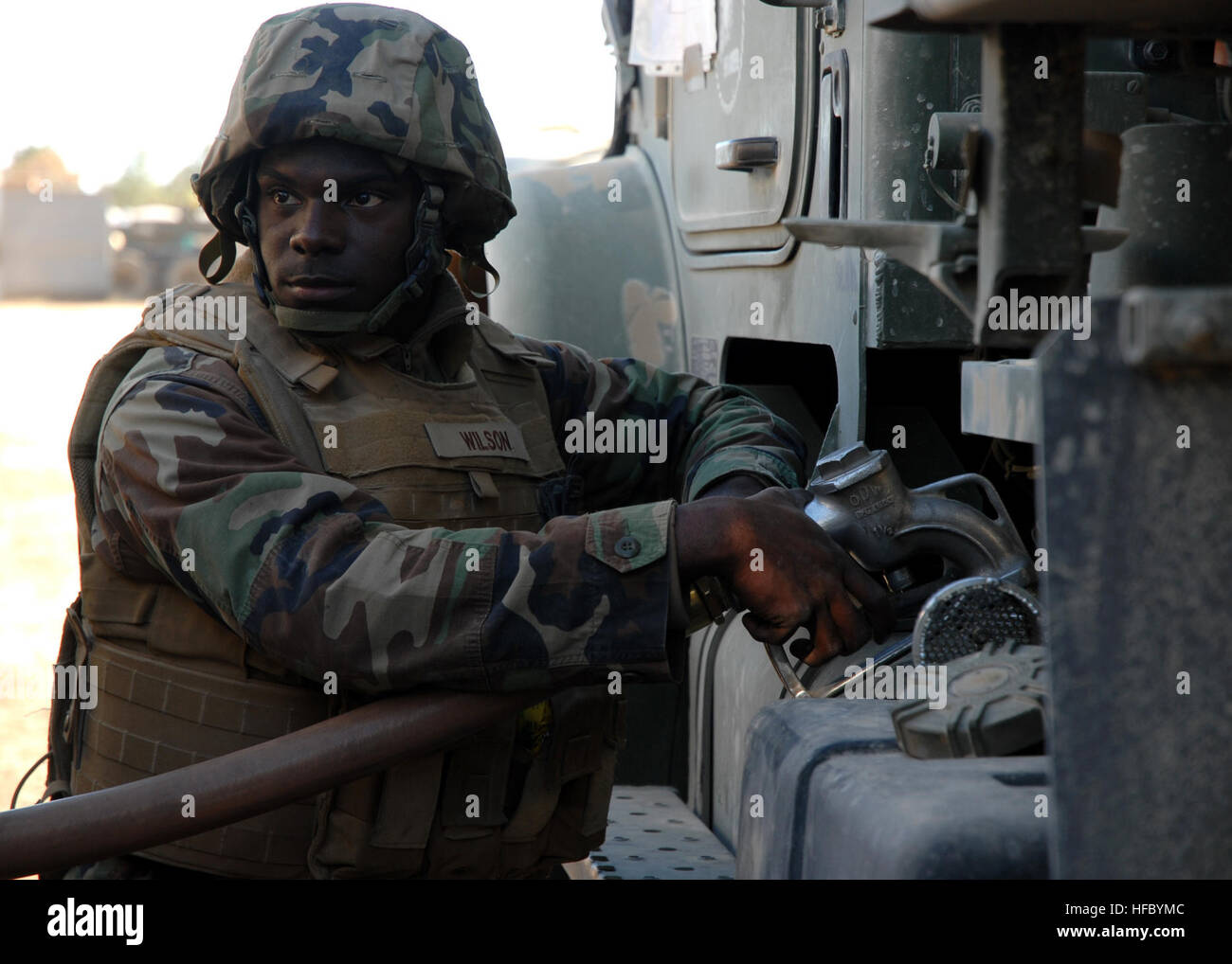 Equipment operator Petty Officer 2nd Class Earnest Wilson, assigned to ...