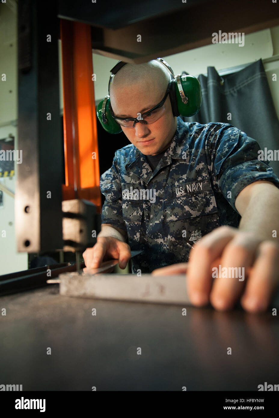 Airman Dustin Mitchell, assigned to future amphibious assault ship USS ...