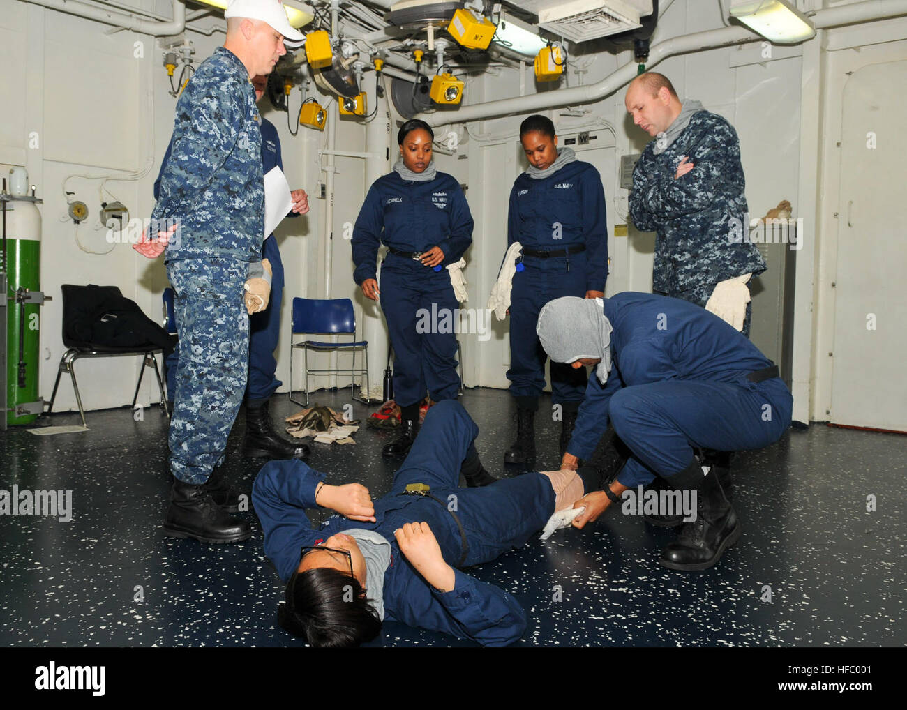 Sailors practice first aid in medical triage aboard the multipurpose ...