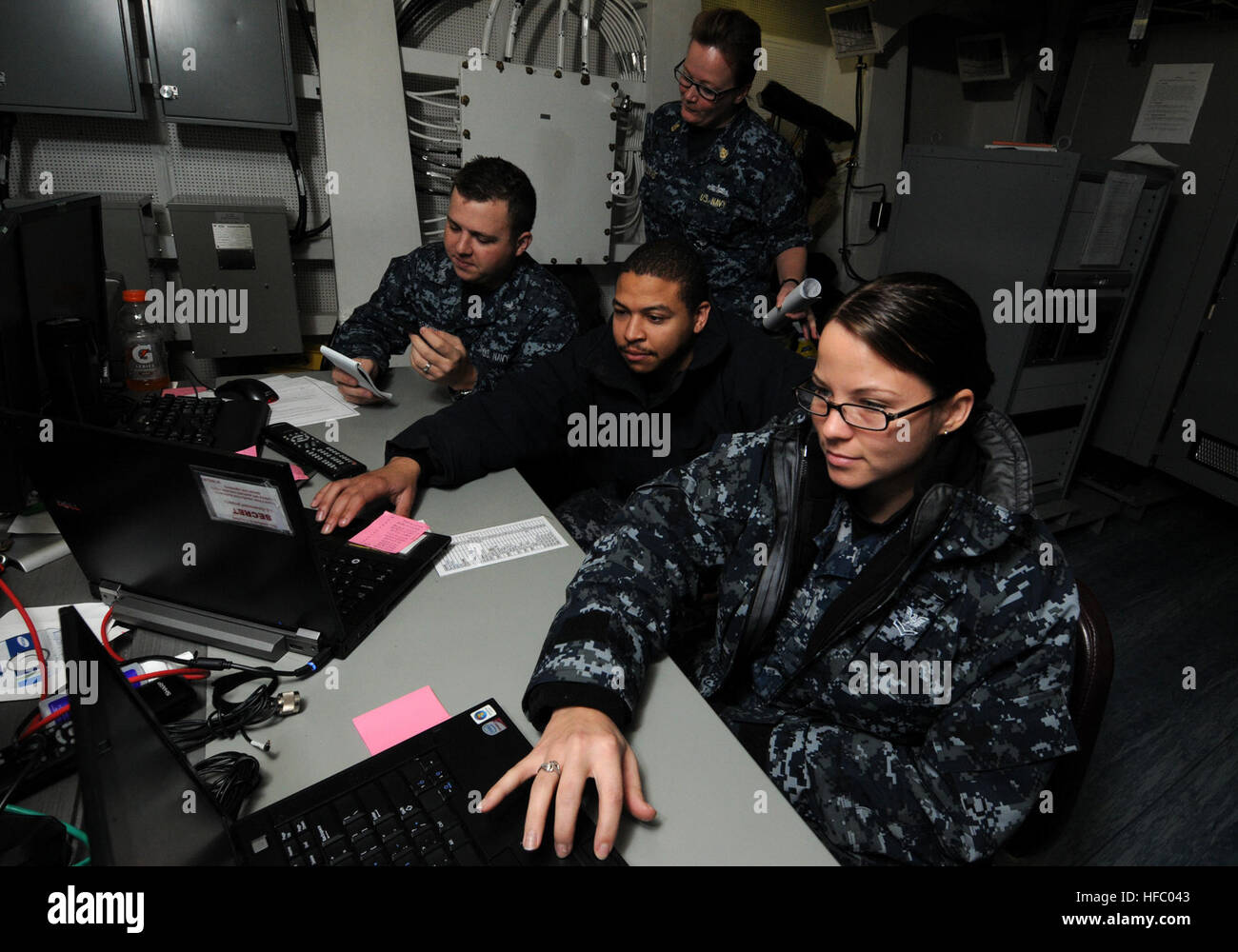 From left to right, U.S. Navy Information Systems Technician 3rd Class ...