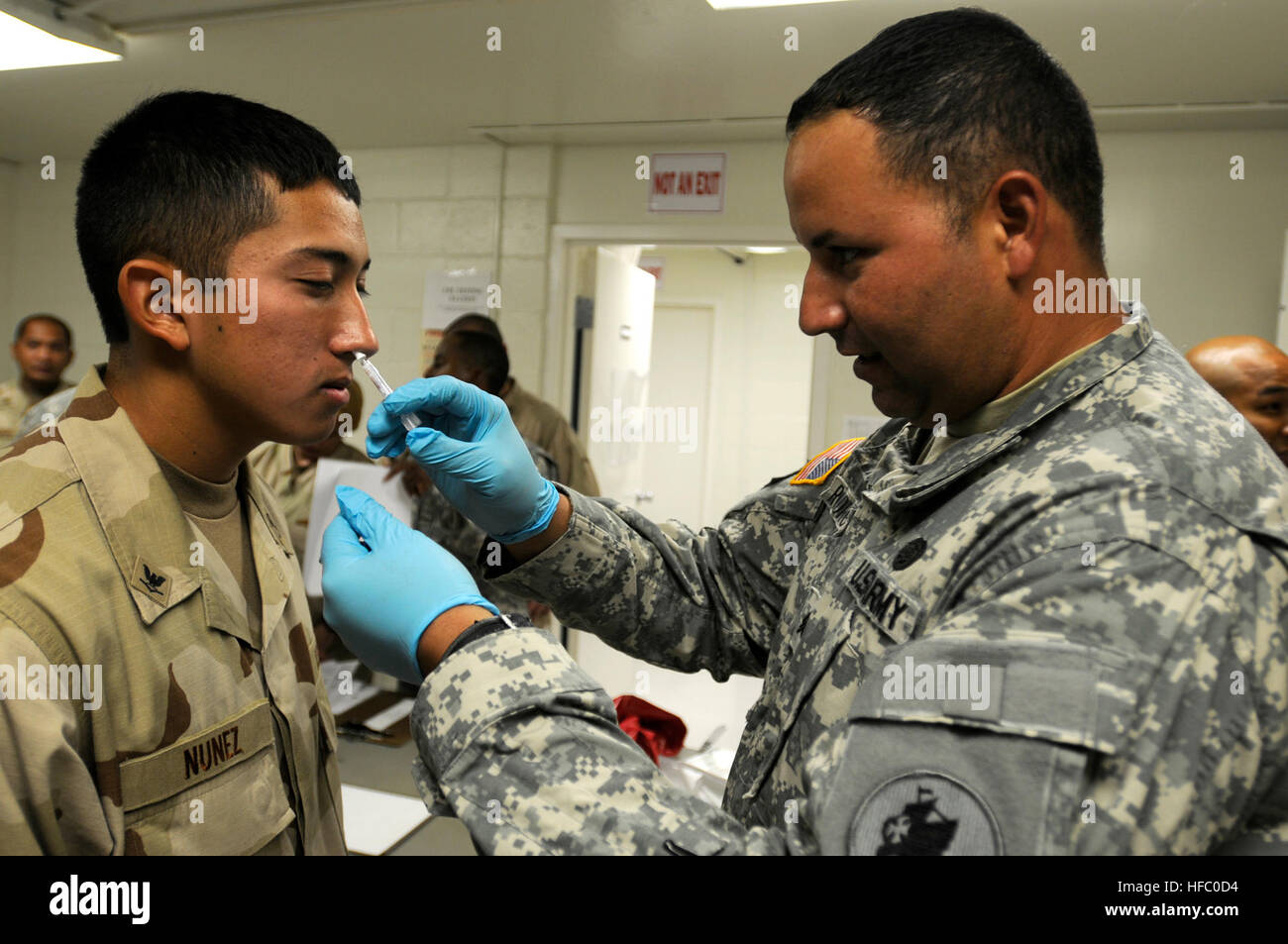 GUANTANAMO BAY, Cuba – Army Sgt. Felepie [CQ spelling] Rodriguez (right ...