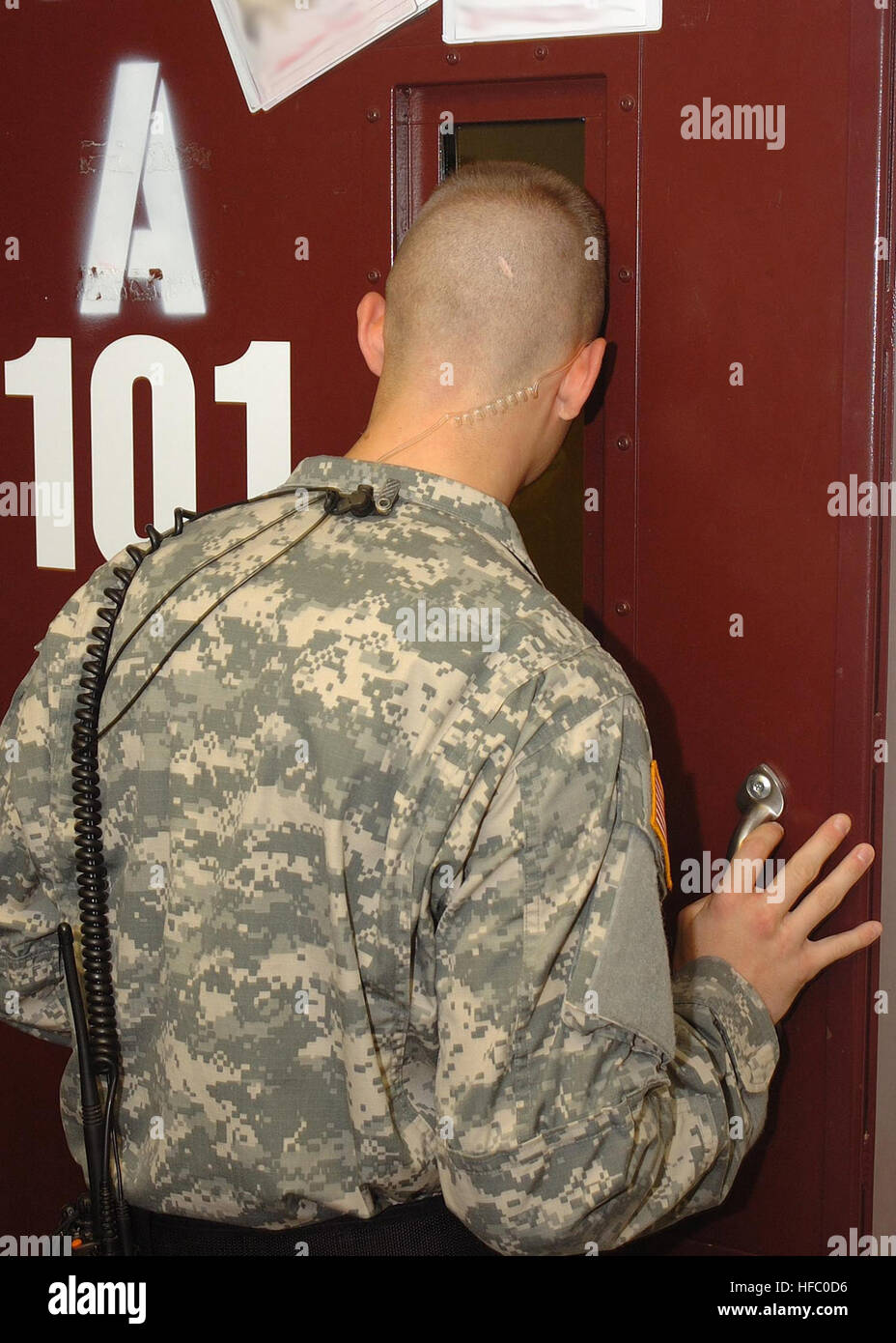 A military trooper monitors a detainee at Camp 5, Joint Task Force ...