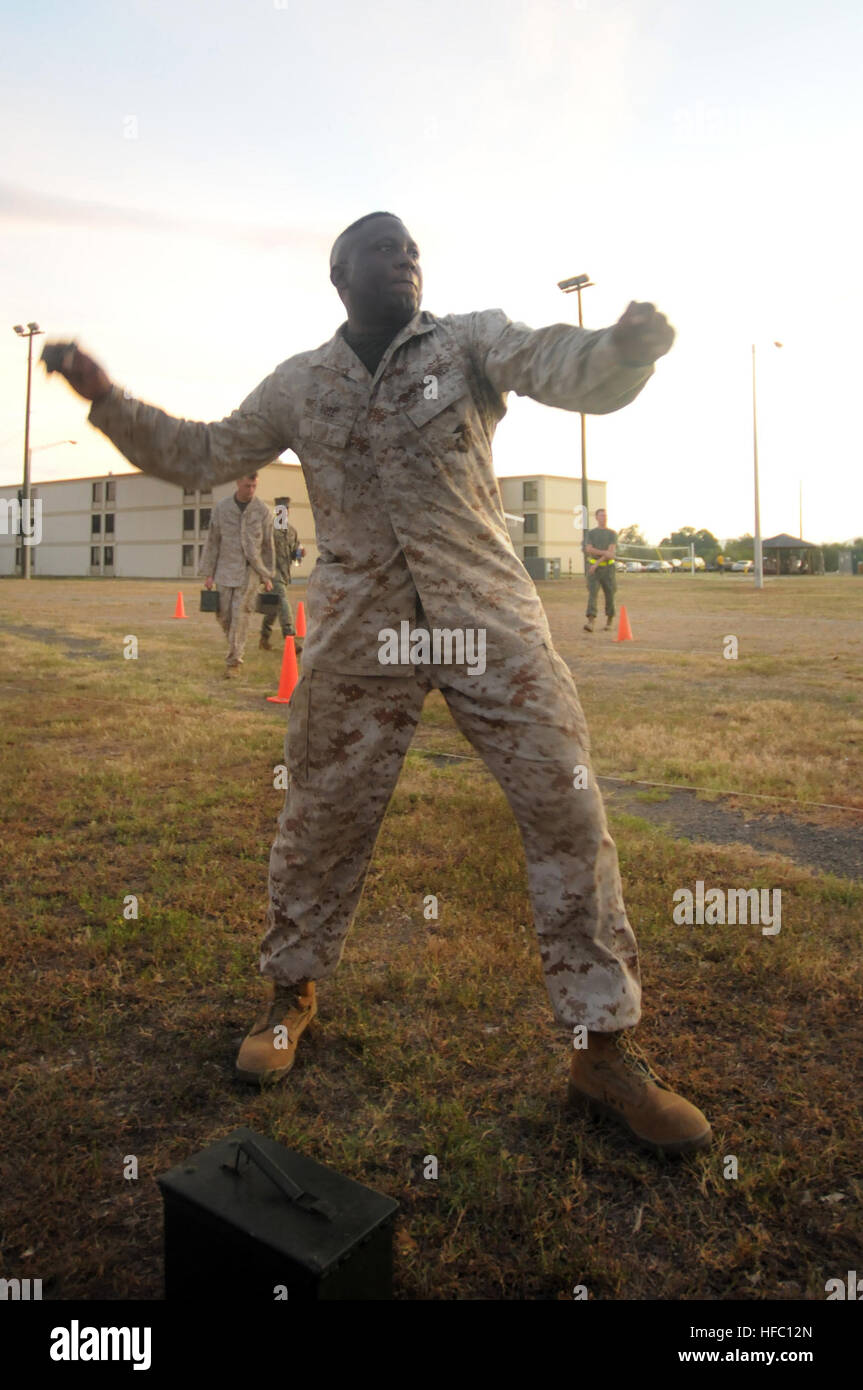 Marine Corps Maj. James Rose, with Joint Task Force Guantanamo, throws ...