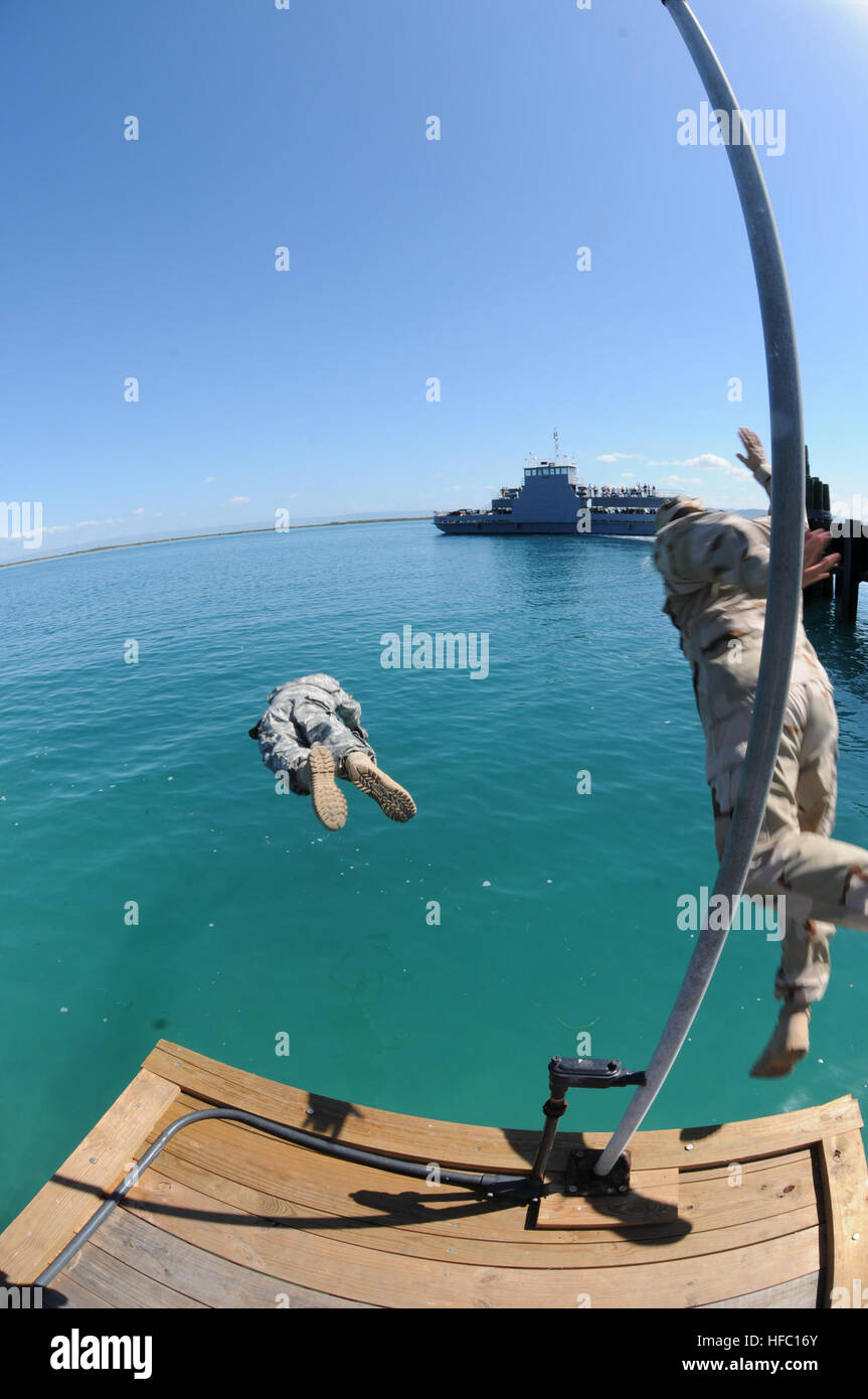 Army Staff Sgt. Benjamin Cossel (left), a soldier forward deployed to ...