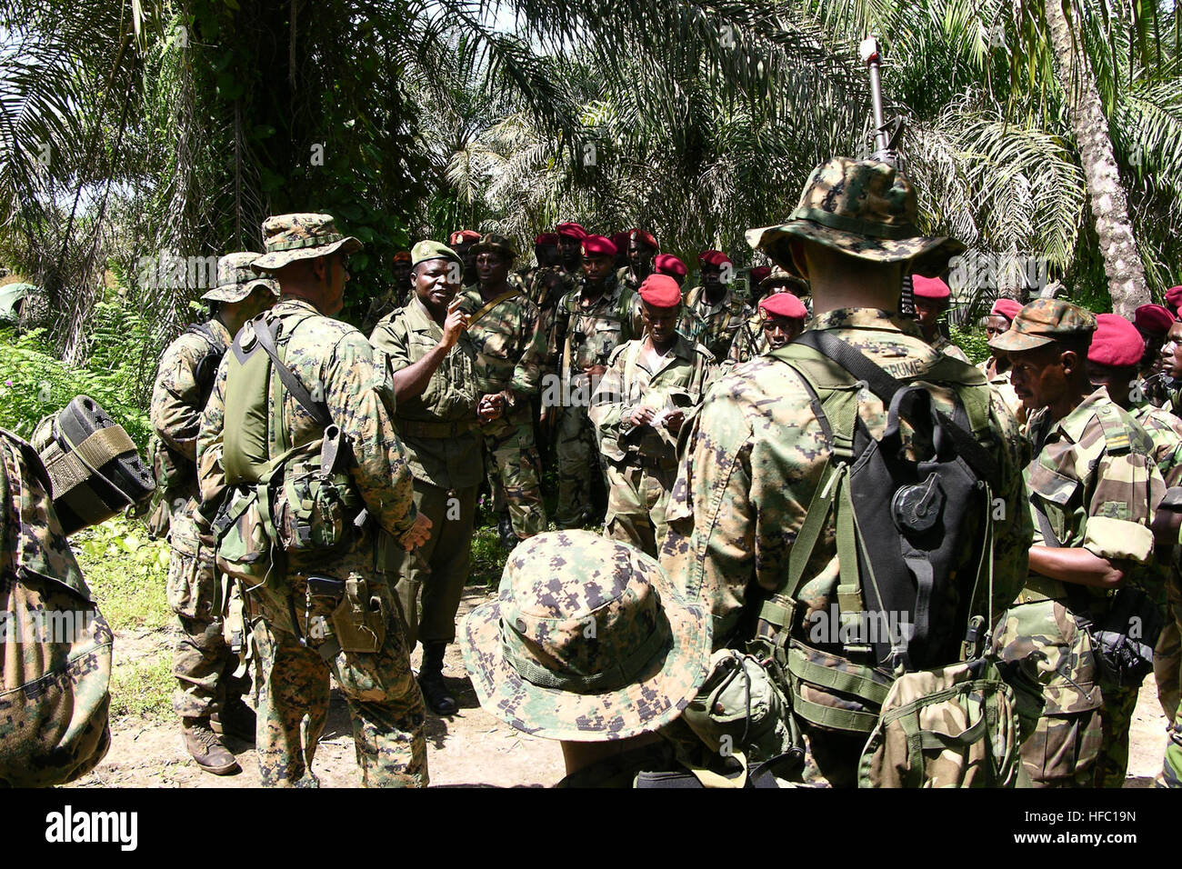 First Lt. David Haba of the Guinean army translates for the Marines ...